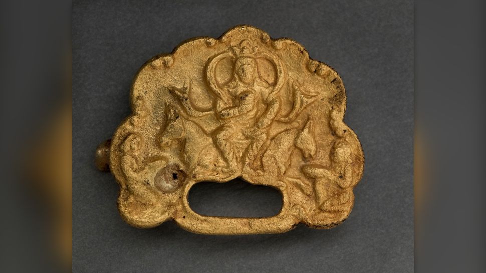 1,500-year-old gold buckles depicting ruler 'majestically sitting on a ...