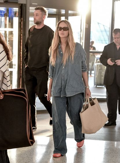 Jennifer Lawrences Travel Outfit Includes Double Denim Trend And 890 3287