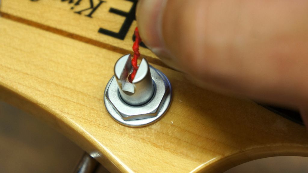 How to restring a bass guitar: guidance from a professional guitar ...