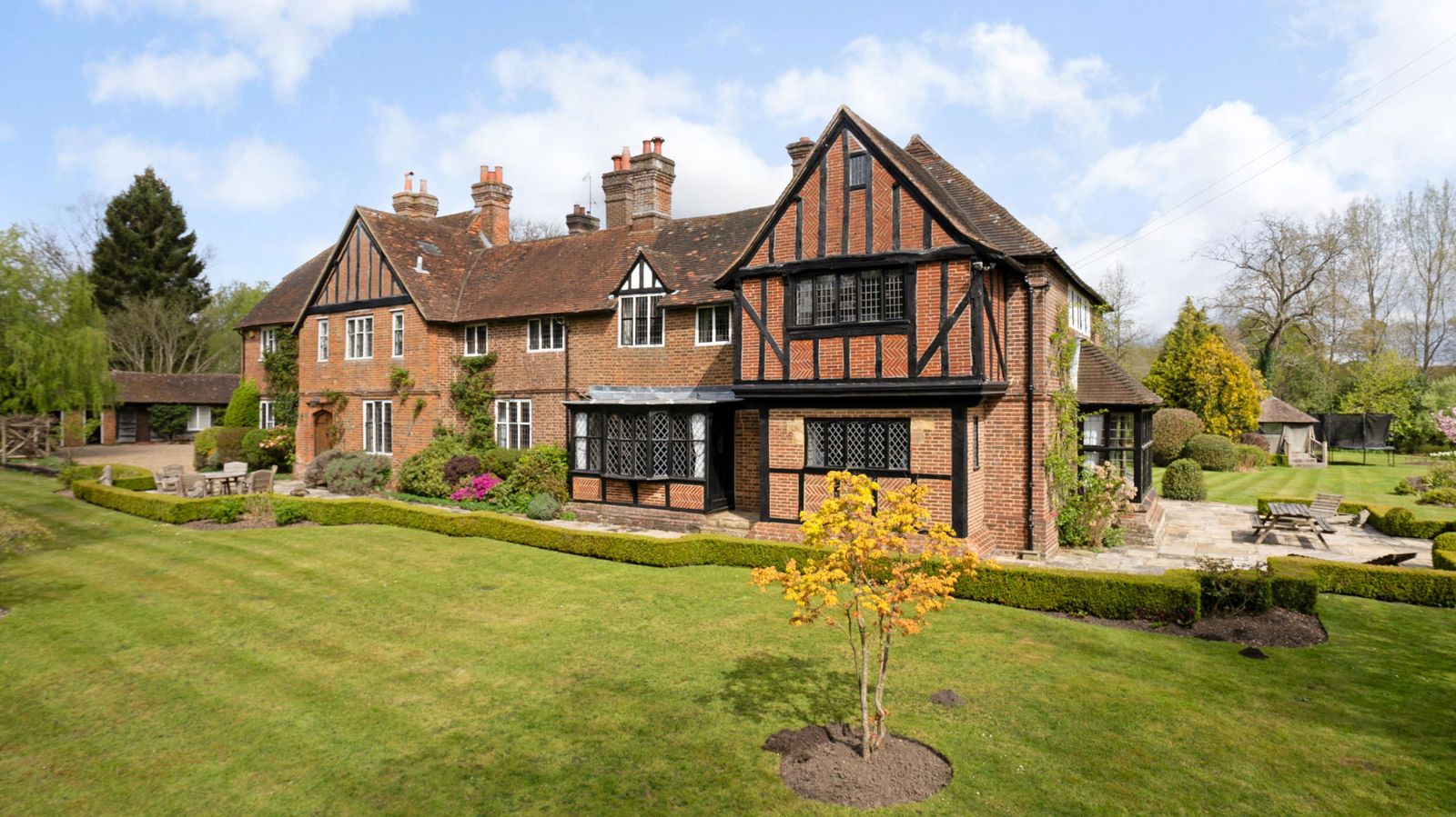 A 17th century farmhouse in Surrey with one of Britain's oldest squash ...
