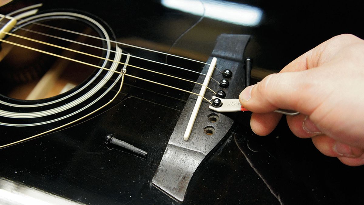 How to set acoustic guitar saddle height | MusicRadar