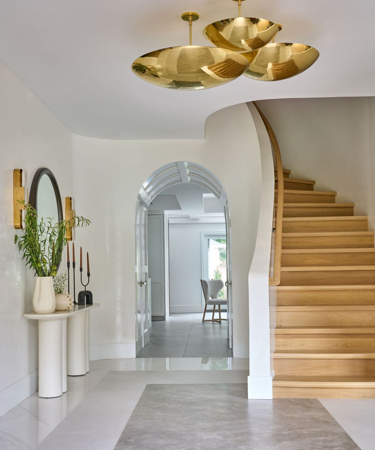 How a curved staircase inspired this home's elegant new look | Homes ...