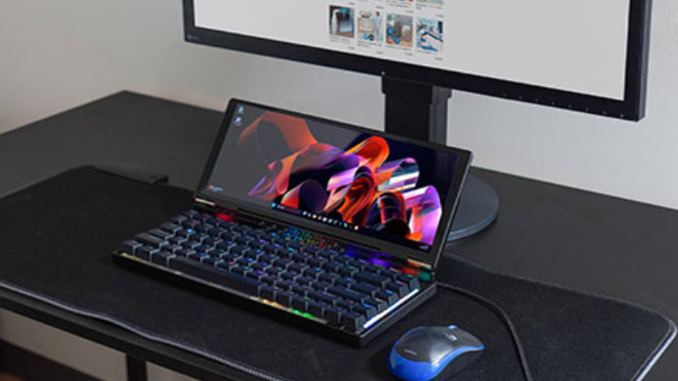This wild mechanical keyboard has a 10-inch screen, RGB lighting, and ...