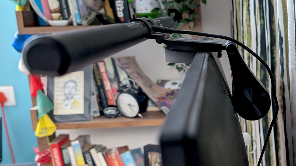 I added this monitor light bar to my home office setup and it’s a game ...