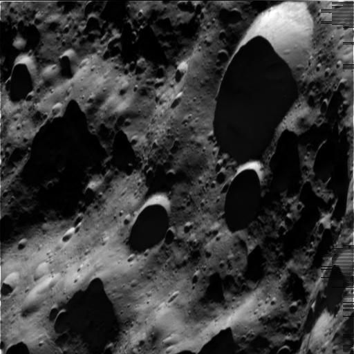 New Photos of Saturn Moon Show a Pockmarked Place | Space