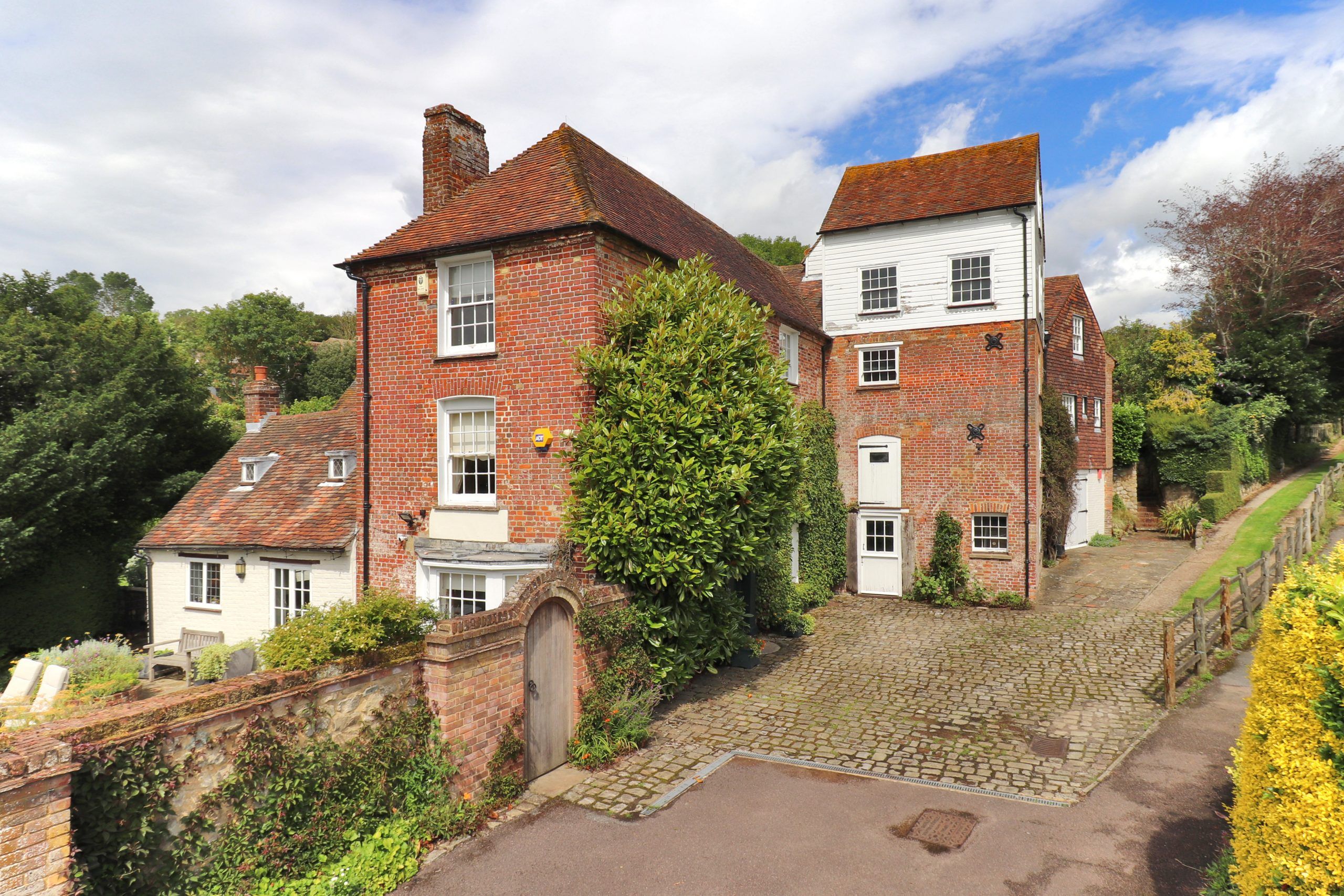 An iconic former watermill in the heart of Hythe with magical gardens ...