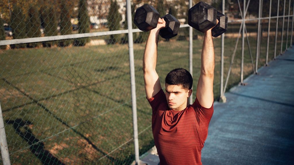 How To Do The Neutral-Grip Shoulder Press | Coach