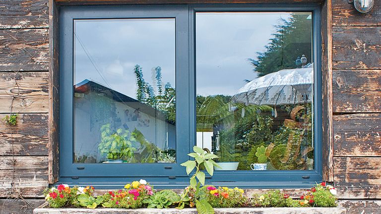 How to paint uPVC windows to update tired plastic frames | Ideal Home