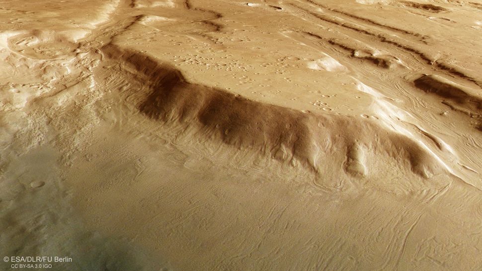 Deep 'scratches' and craters on Mars tell the tale of a Red Planet ice ...