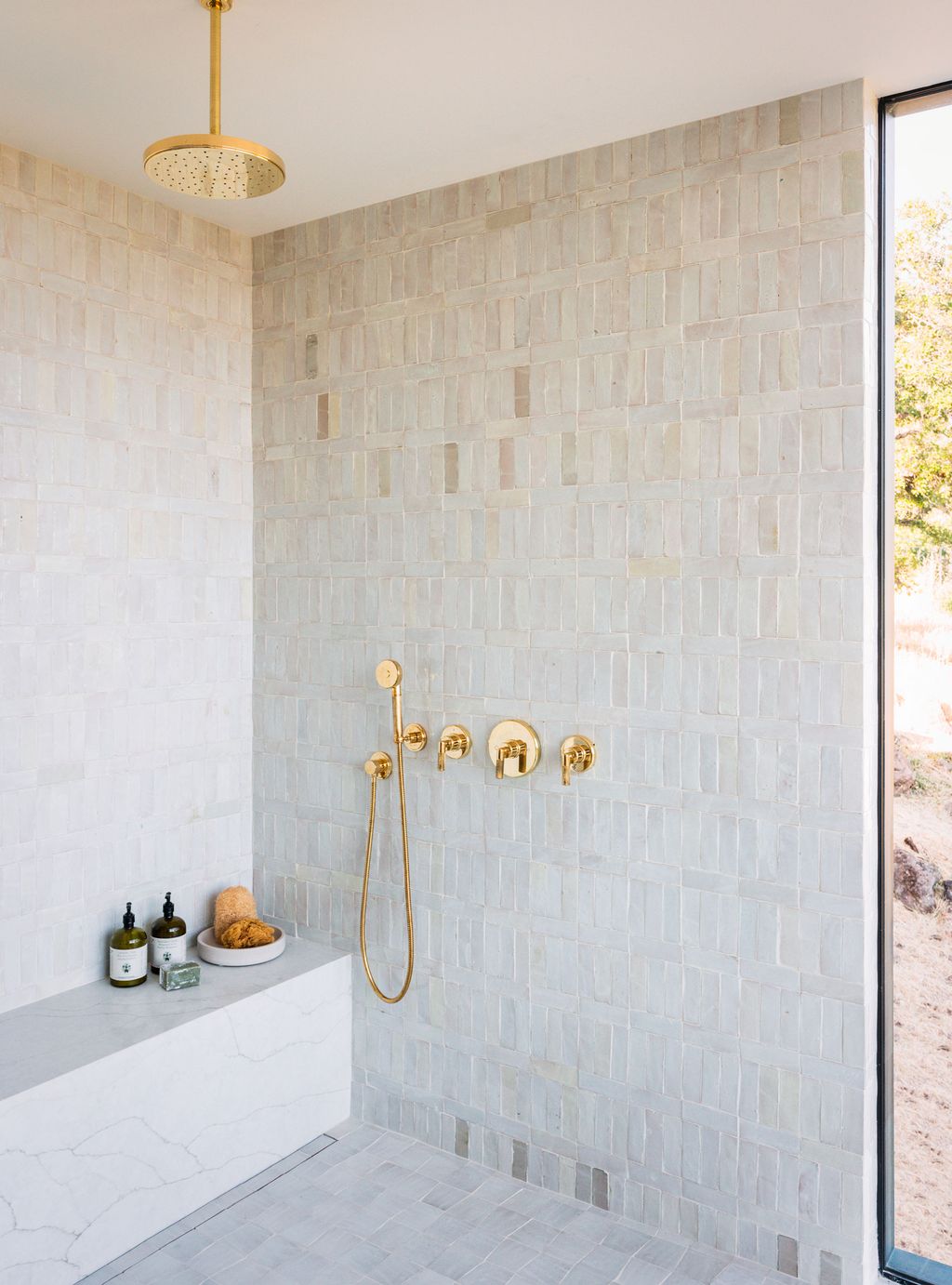 Why is my shower head dripping? Plumbing experts | Homes and Gardens