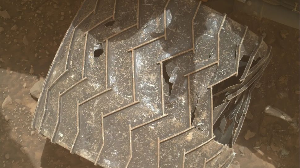 New NASA images reveal giant hole in Curiosity rover's wheel after 12 ...