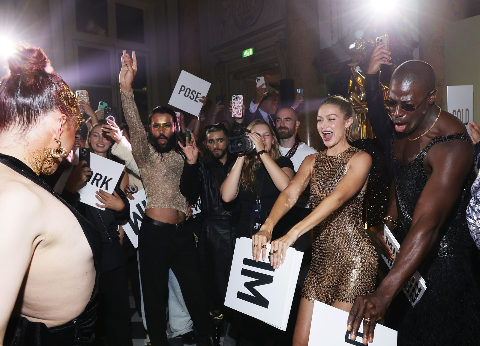 Gigi Hadid Matches Her Naked Manicure To Her Gold Naked Dress At Paris Fashion Week Marie Claire