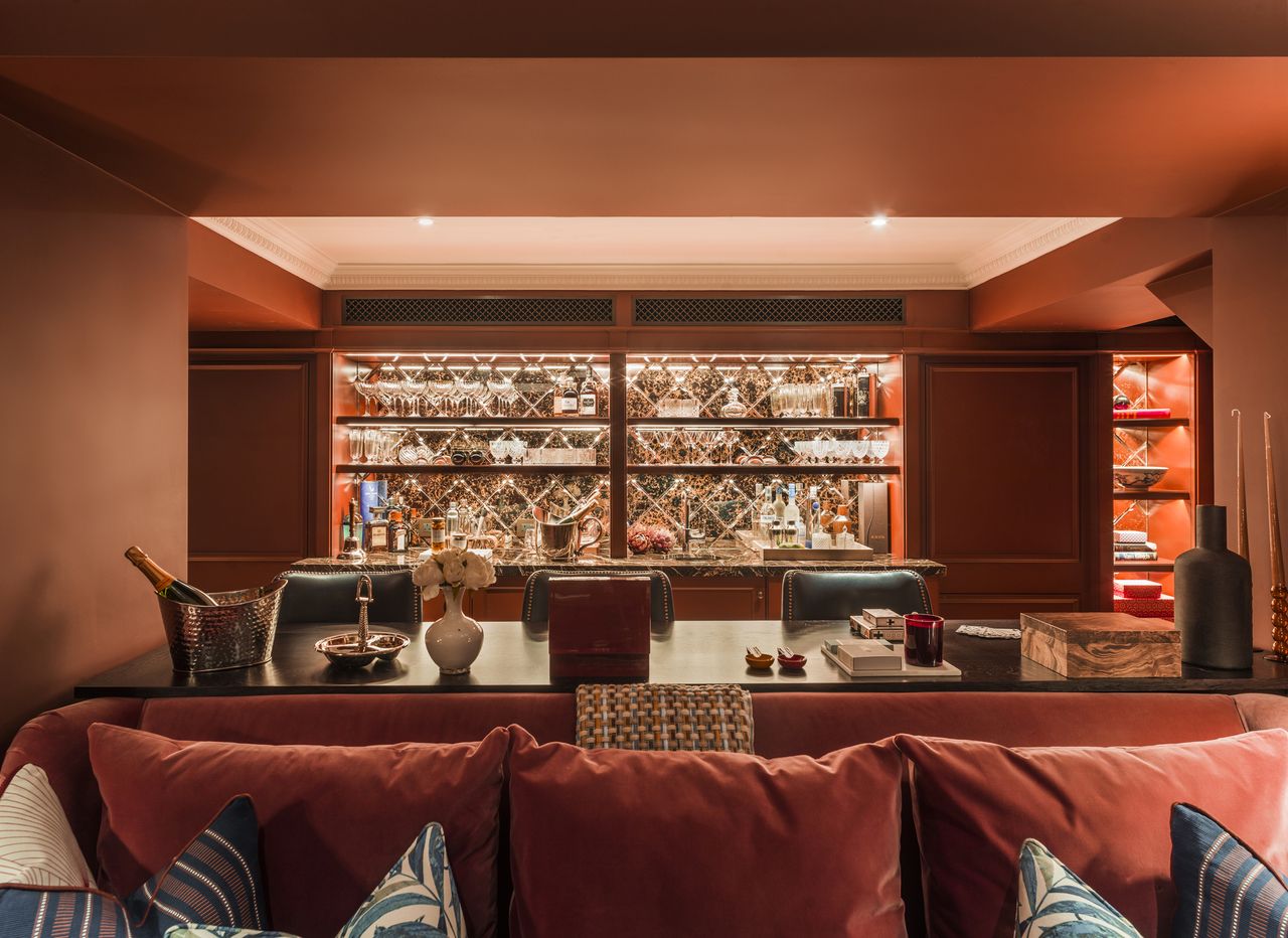 These rust living rooms have convinced me it's the color trend of 2023 ...