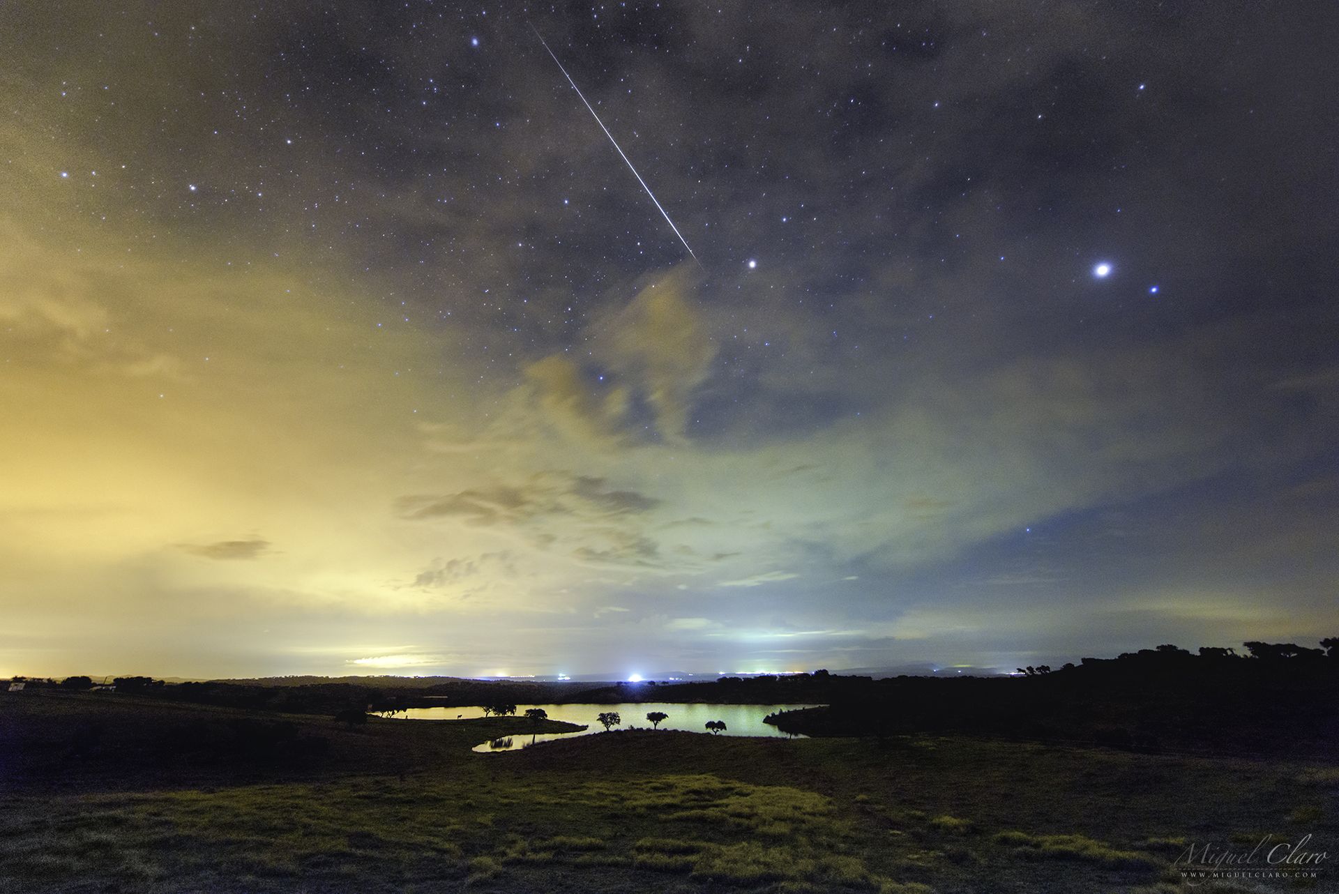 Meteor and Jupiter Light Up the Night Sky Over a Glistening Lagoon ...