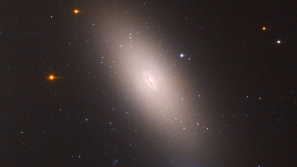 Bizarre 'relic galaxy' is missing a key component of the universe, and ...