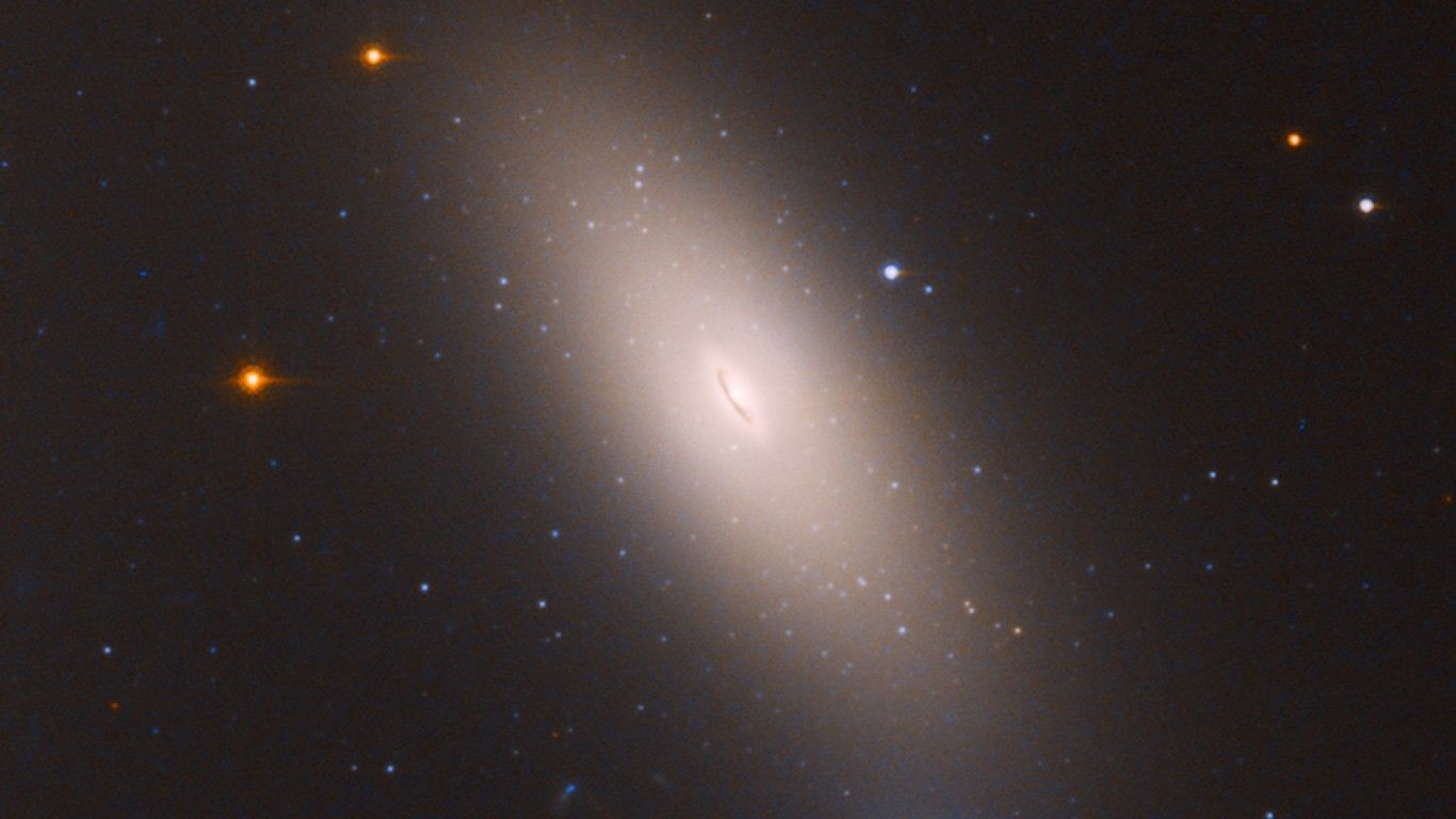 Bizarre 'relic galaxy' is missing a key component of the universe, and ...