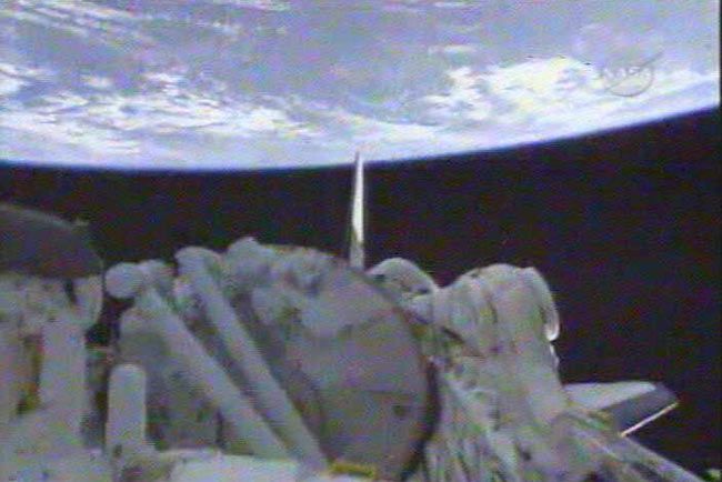 Shuttle Astronauts Scan Heat Shield | Space