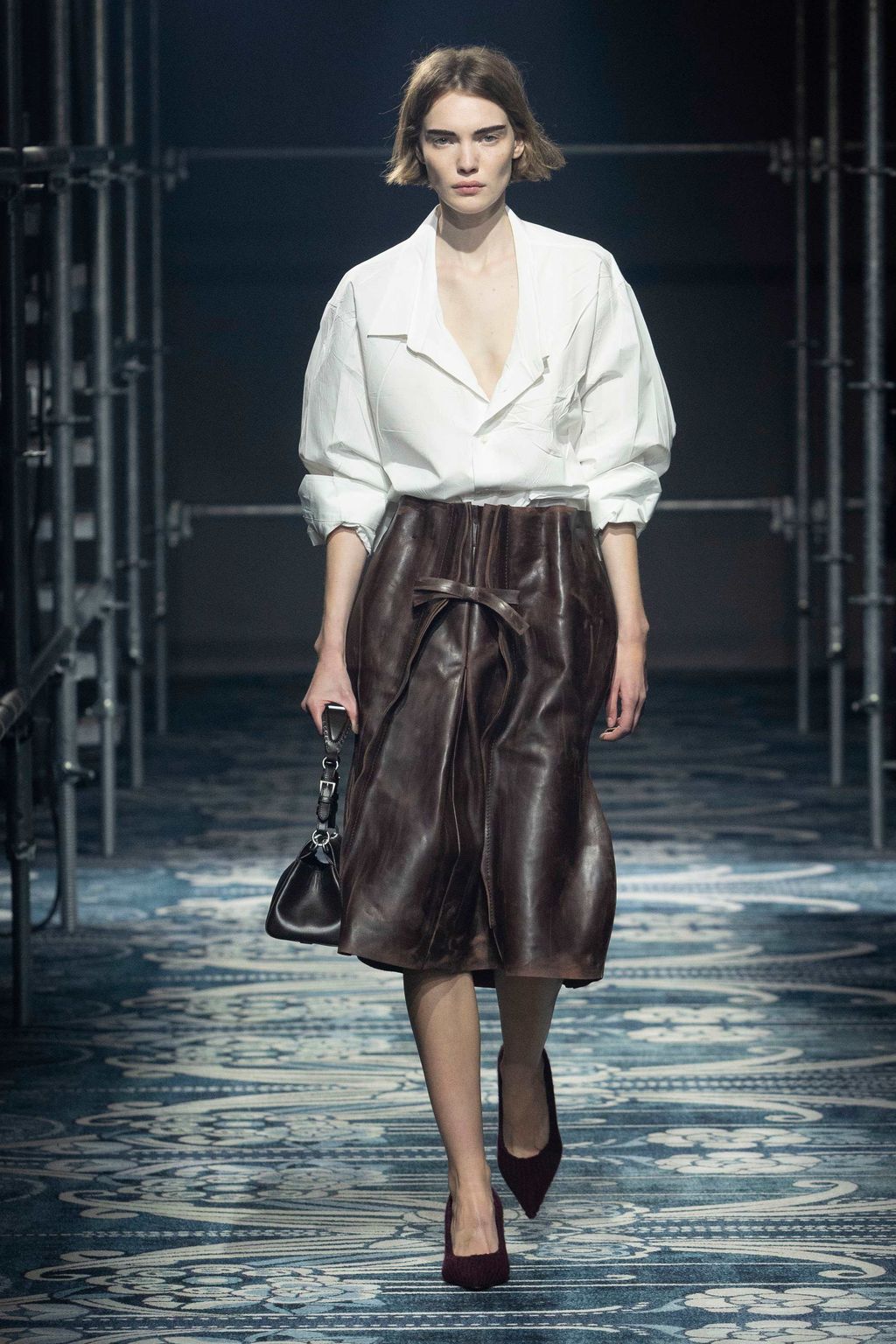 Prada Fall 2025: Raw Glamour and the Allure of the Undone | Who What Wear