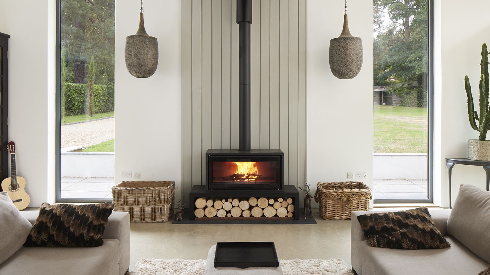 Log store ideas for keeping your firewood dry and tidy | Homebuilding