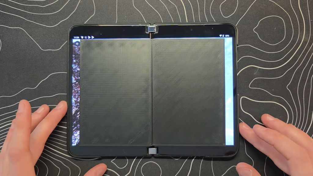 Apple's upcoming iPhone Fold looks to copy Microsoft's Surface Duo ...