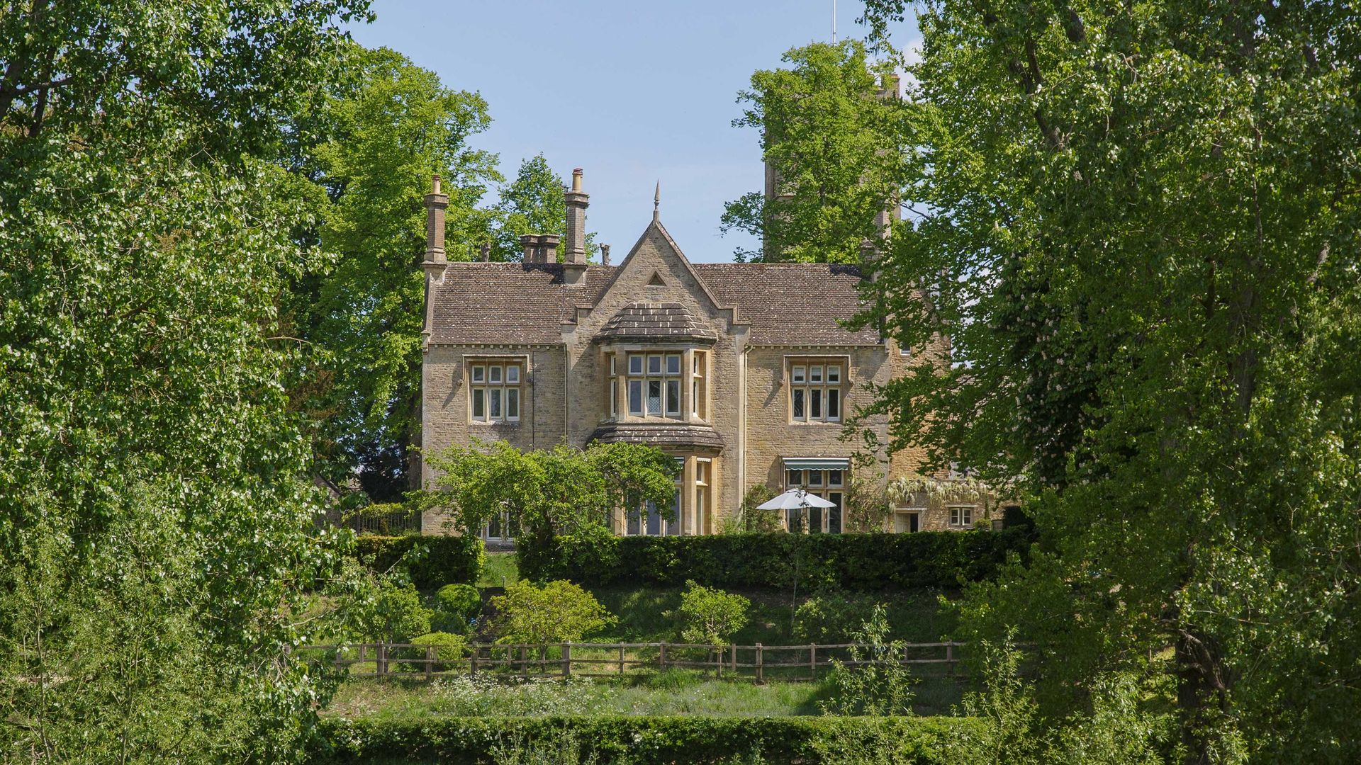A heartbreakingly pretty old rectory in the idyllic Cotswolds valley ...