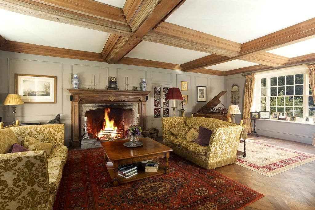 The Kent manor with an original Tudor fireplace and space for a string ...