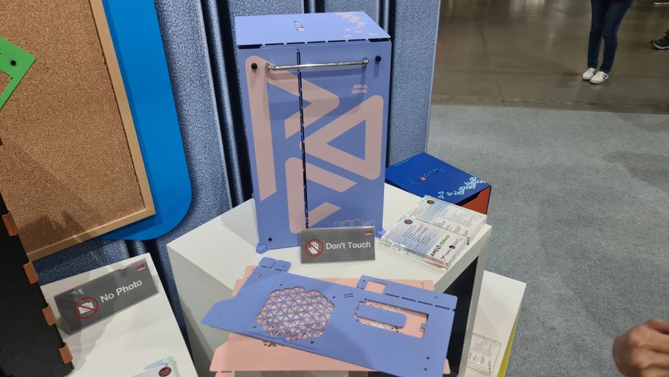 Oh heck yeah, these gaudy origami PC cases now come with water cooling ...