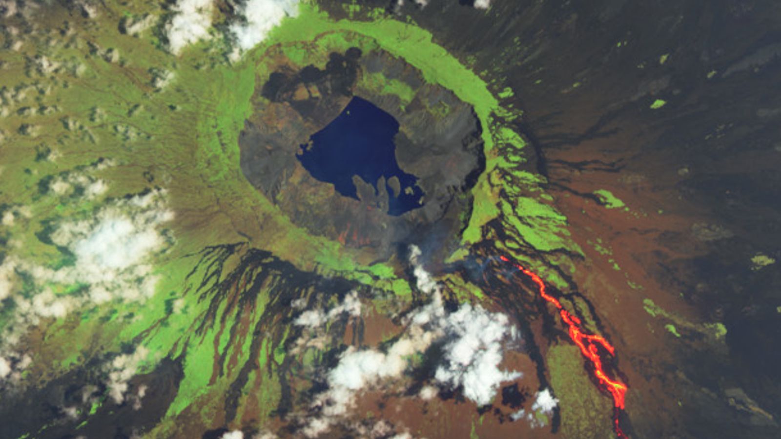 Earth from space: Lava bleeds down iguana-infested volcano as it spits ...