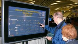 SMART Technologies demonstrates interactive overlay device at Digital ...