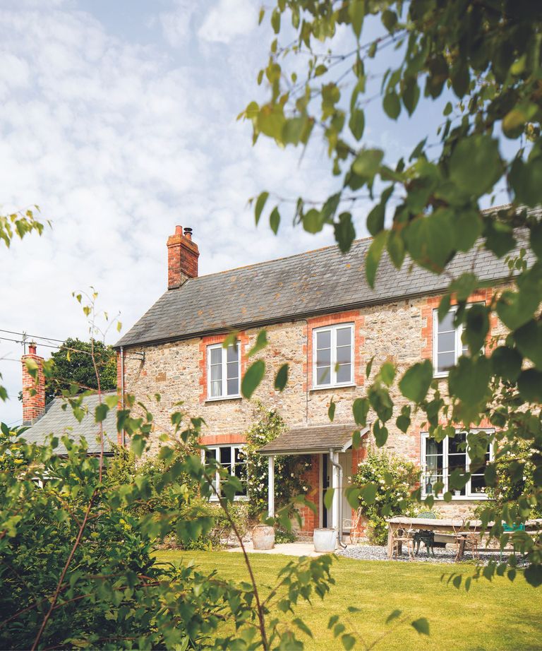 This cozy 19th century stone farmhouse's kitchen was once a barn – you ...