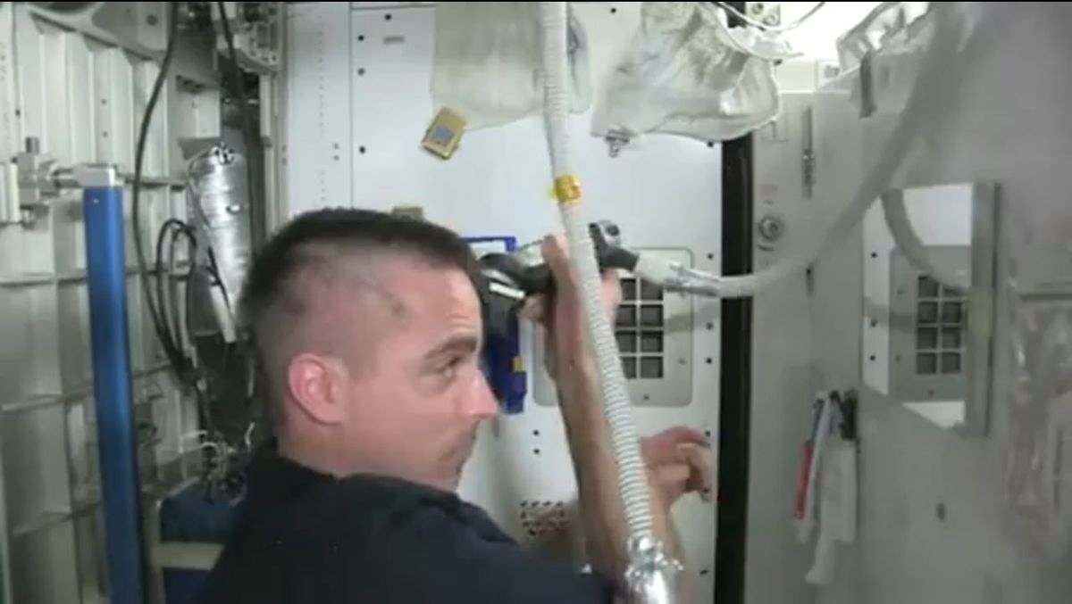How to Shave Your Head in Space: Astronaut Video | Space