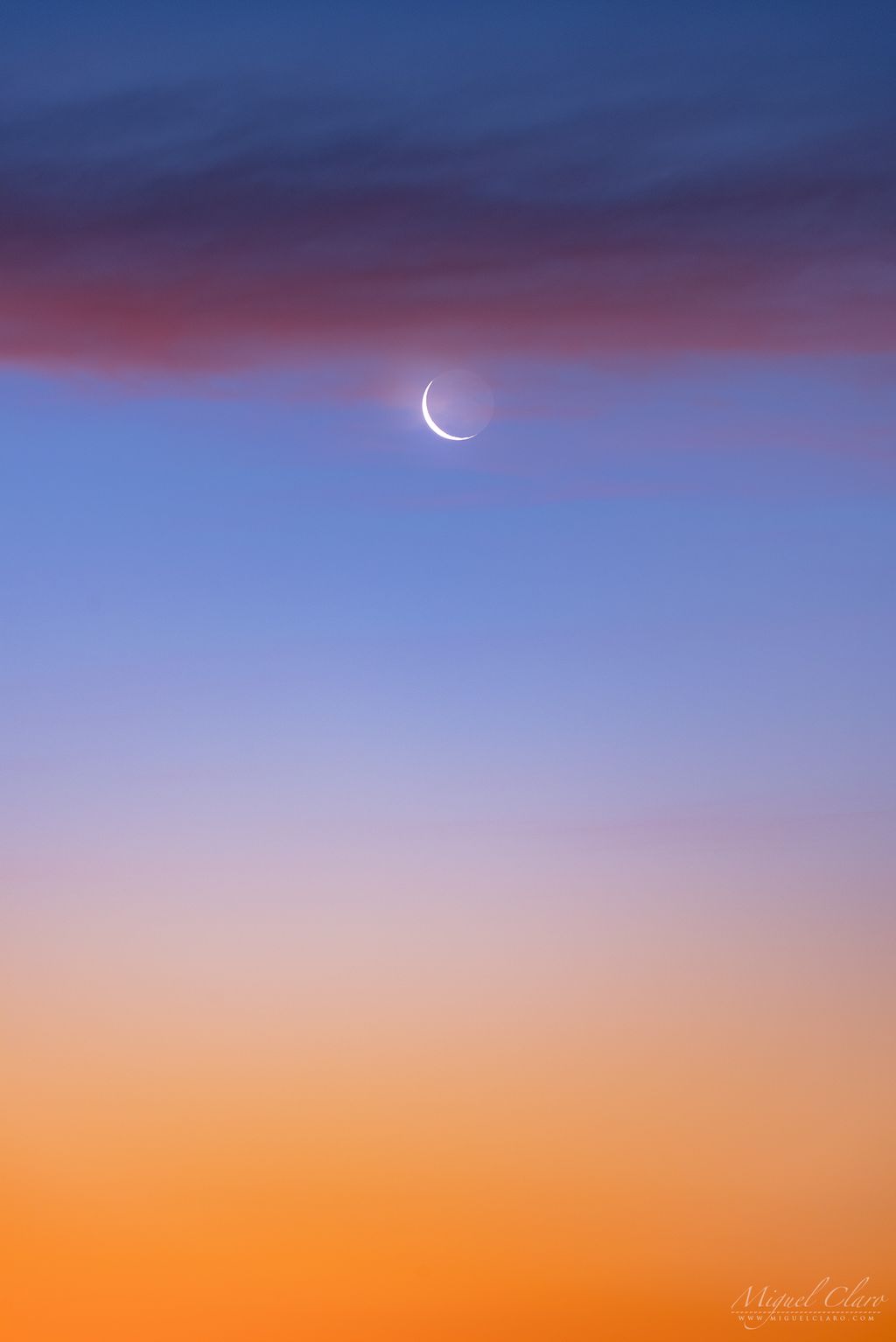 Pink Clouds Adorn Crescent Moon in Gorgeous Photo | Space