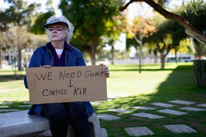 America's gun-control debate: The dueling protest signs | The Week