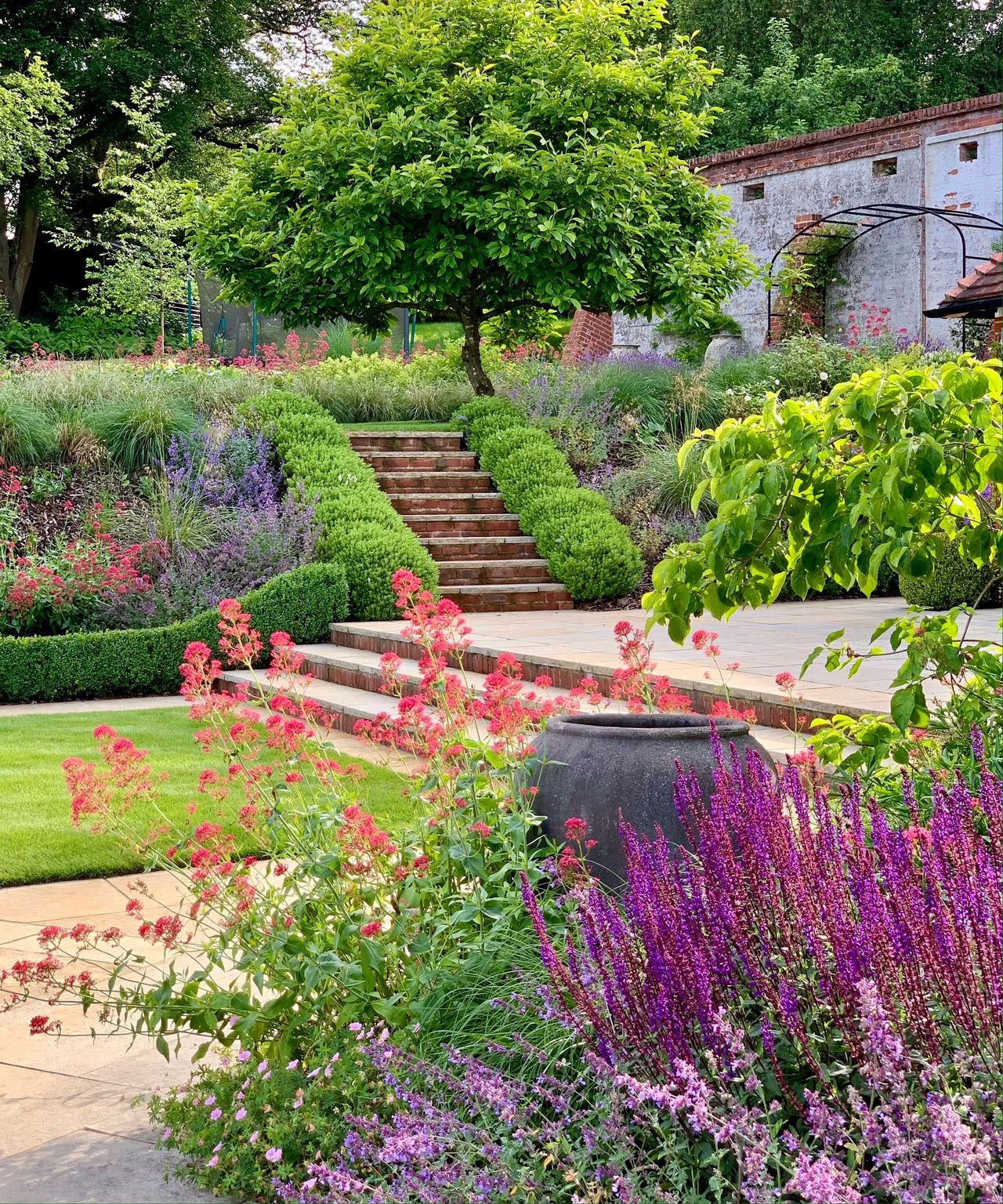 How to design a sloping garden: key points to consider | Homes & Gardens