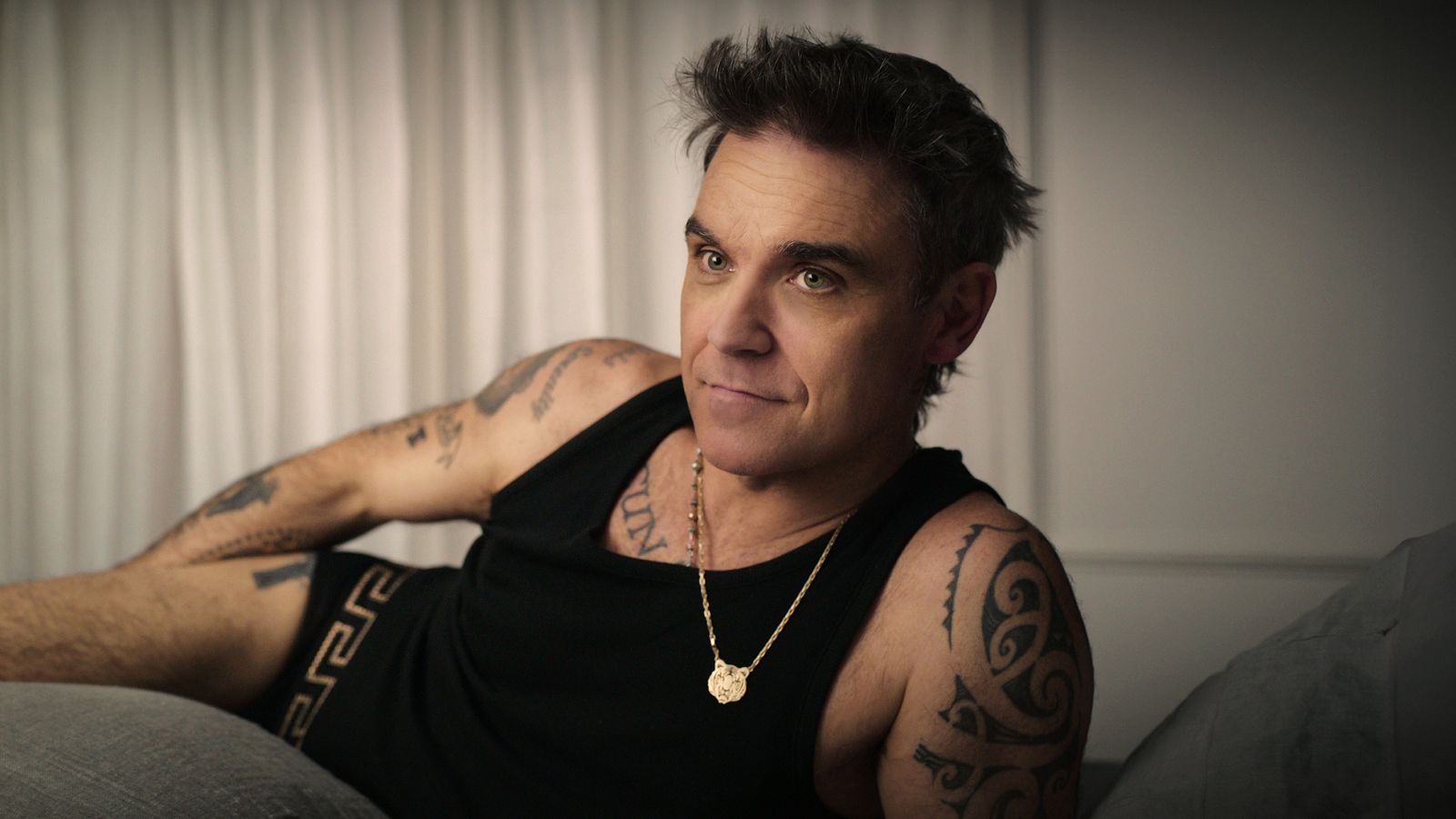 Which of Robbie Williams' songs did Guy Chambers write? | Woman & Home