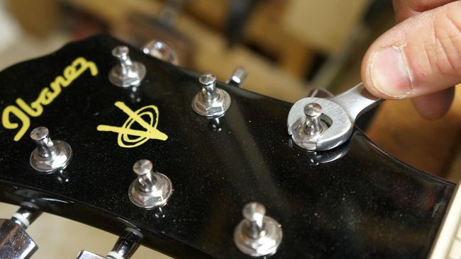 How to adjust acoustic guitar action, lower your strings and set up ...