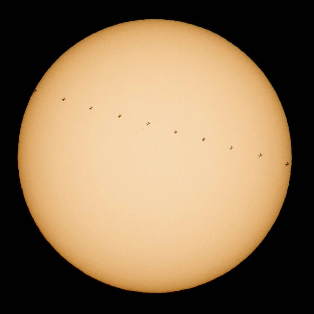 NASA Photographer Sees International Space Station Cross the Sun | Space