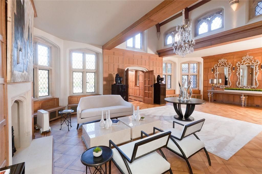 An £18 million Surrey mansion, with vaulted hall, turrets, and a ...