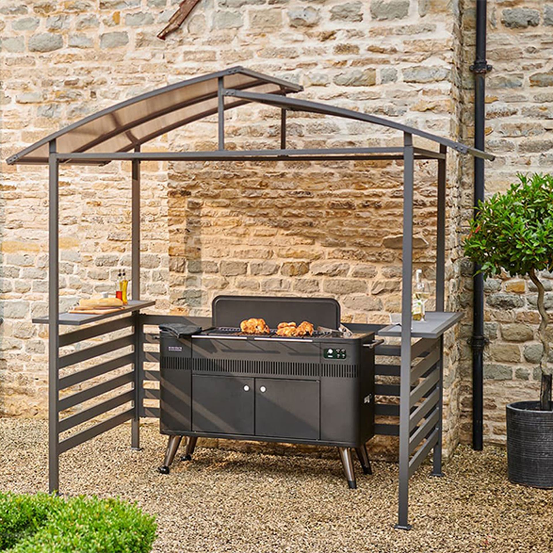 11 covered outdoor kitchen ideas for sheltered cooking and dining ...