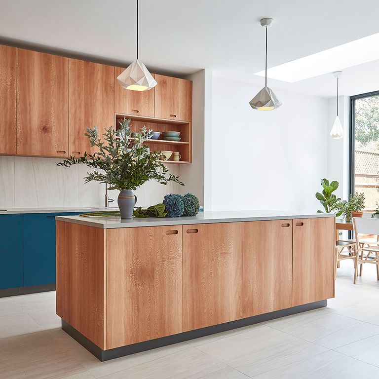 Retro plywood kitchen makeover with blue doors and Corian worktops ...