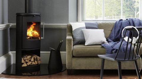 Corner log burner ideas for a cosy living space | Homebuilding
