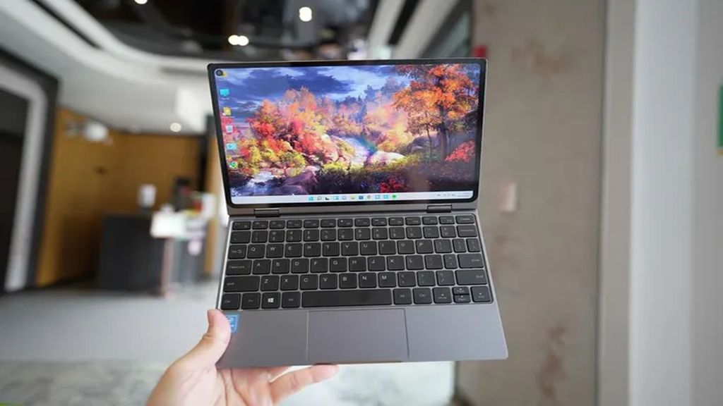 This cute convertible laptop looks like a mini PC with a touchscreen, a ...