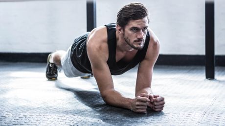 How To Do The RKC Plank | Coach
