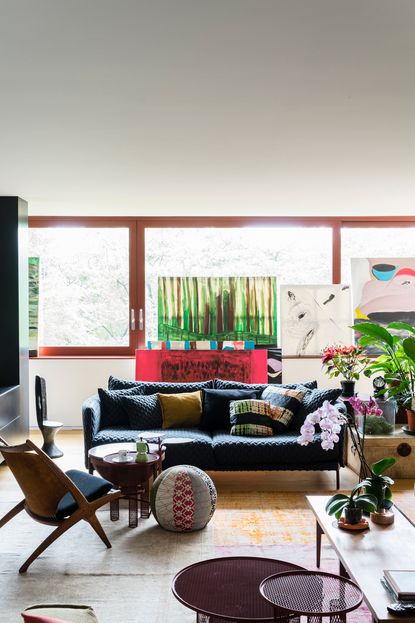 Explore this cabin-style house in Italy with colourful global ...