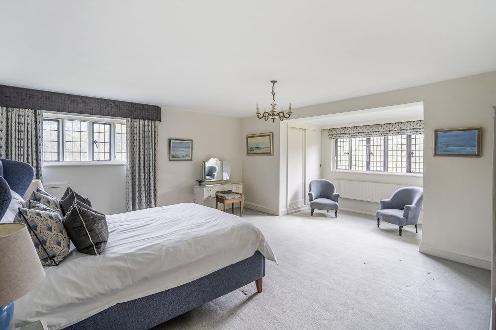 A 17th century farmhouse in Surrey with one of Britain's oldest squash ...