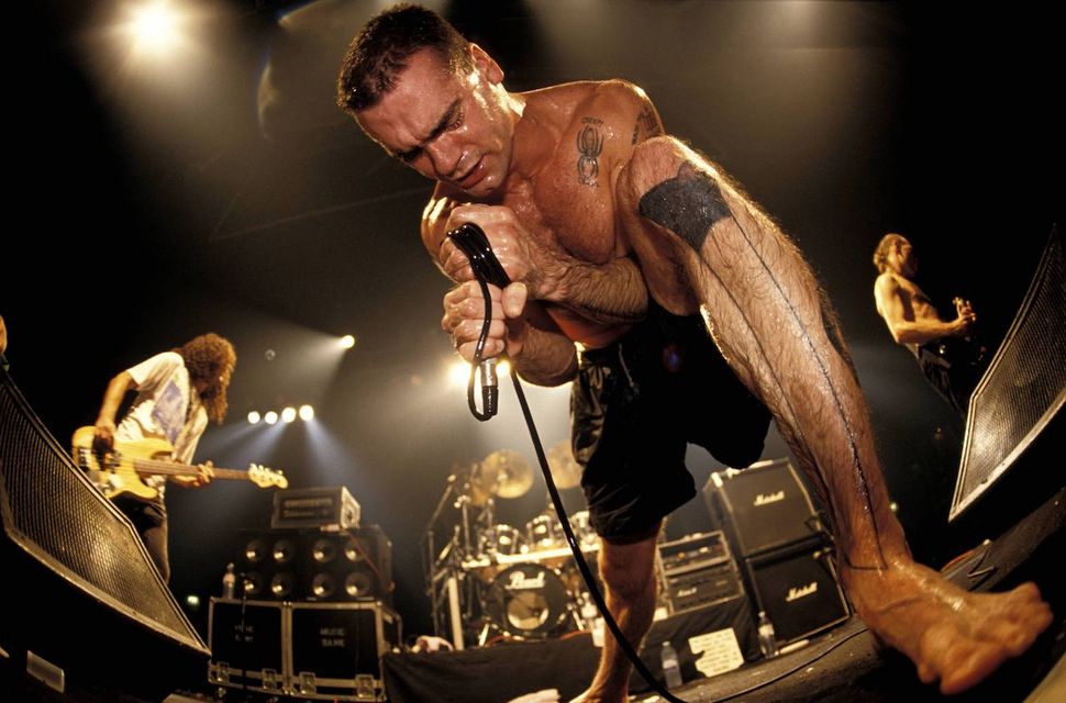 Music photographer Mick Hutson has died, aged 58 | Guitar World