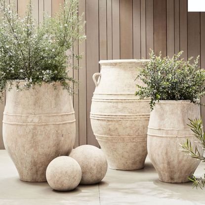 How to style with large decorative pots in the front yard | Homes and ...