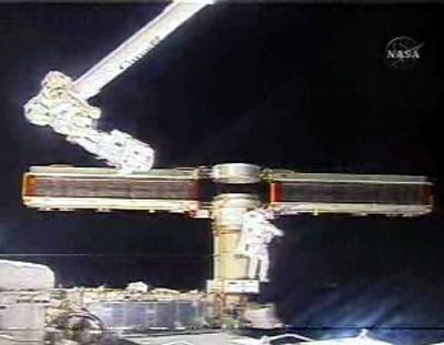 Atlantis Astronauts Fix Shuttle Blanket, Furl Solar Array | Space