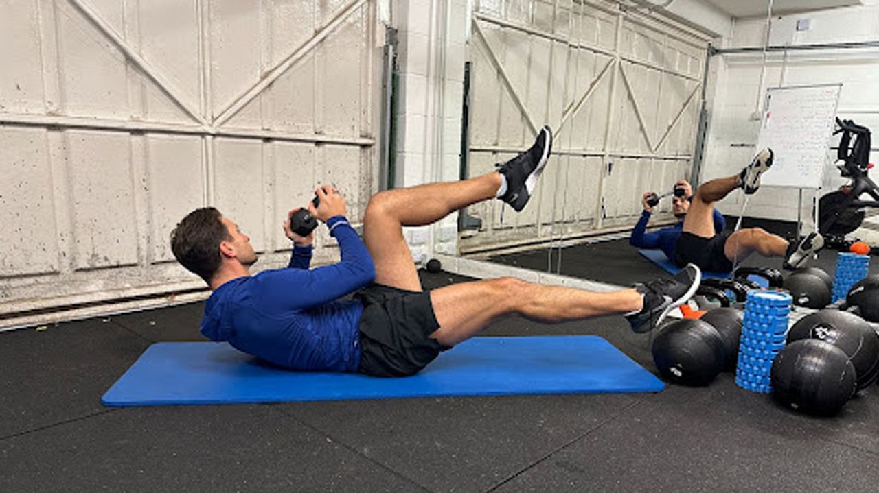 Nine dumbbell ab exercises to strengthen and define your core muscle ...