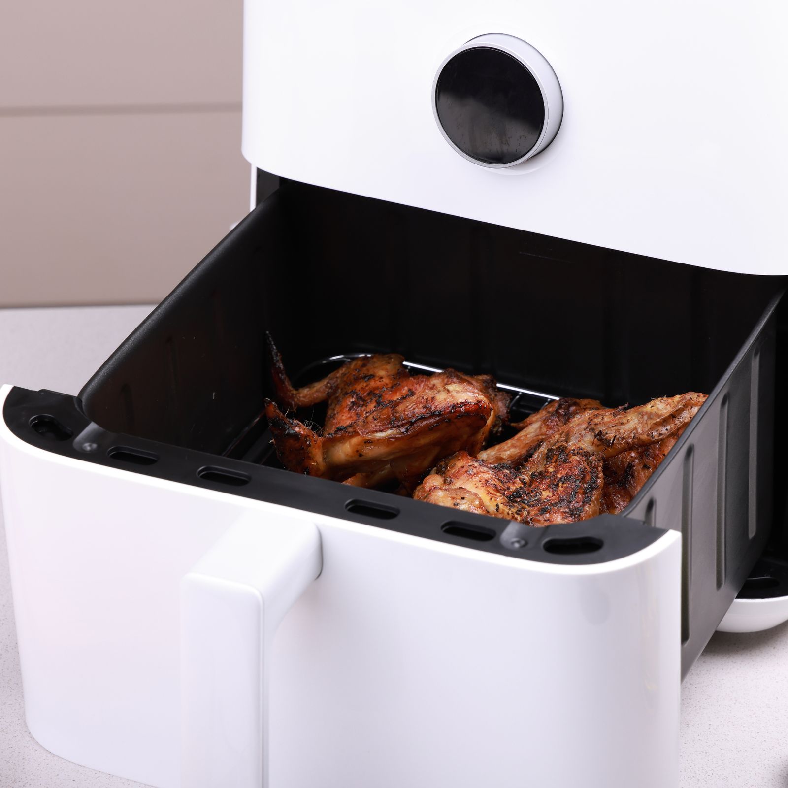 Why is my air fryer smoking and how do I get it to stop? | Ideal Home